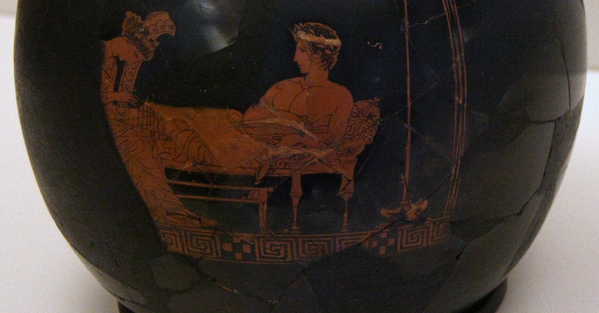 Symposiast and Hetaira Playing a Harp - World History Encyclopedia