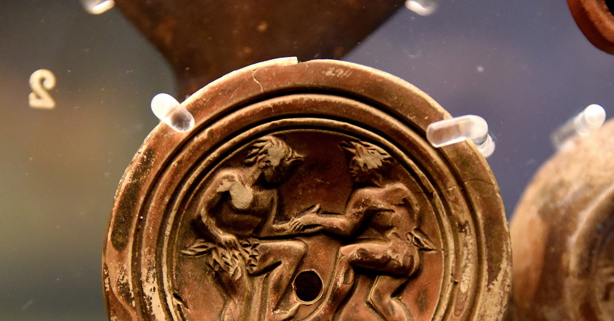 Lamp Showing Satyrs Treading Grapes - World History Encyclopedia